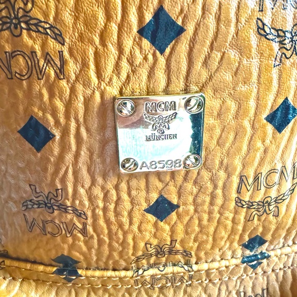 MCM | Bags | Mcm Stark Visetos Small Sidestud Backpack Cognac Euc ...